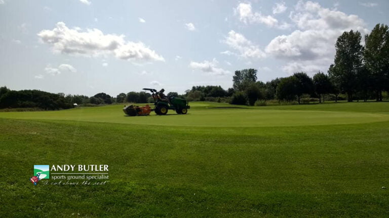 Autumn renovation and maintenance of golf green, Ferndown, Dorset ...